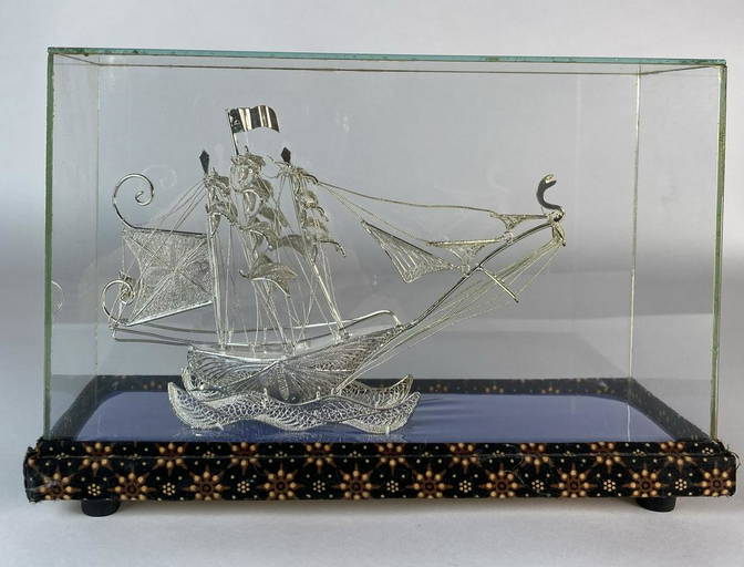Silver Model Of Ship
