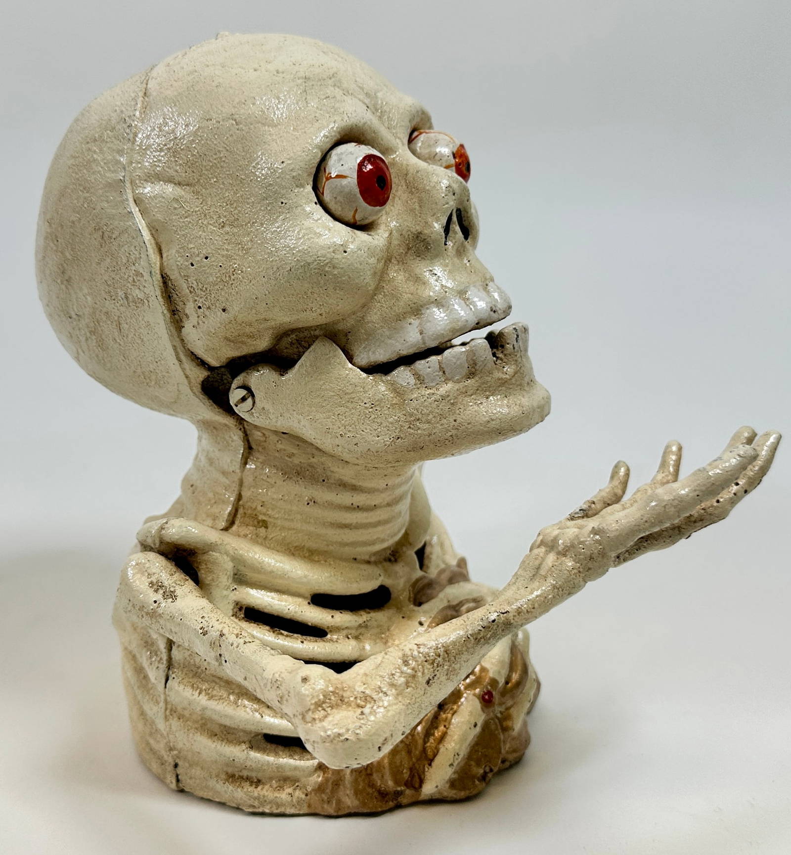 Cast Iron Skeleton Coin Bank Auction