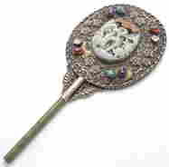 A Chinese jade medallion hand mirror. - Jun 13, 2015 | Quinn's Auction ...
