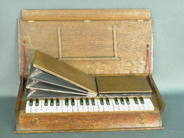 2316: Portable Victorian pump organ in book s
