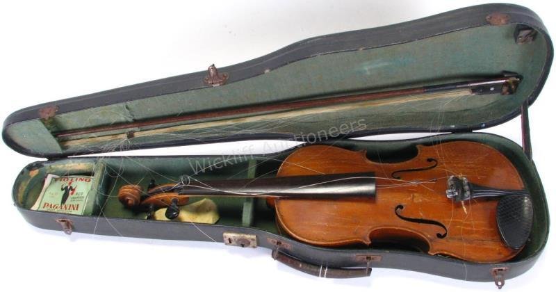 A vintage Stradivarius copy violin