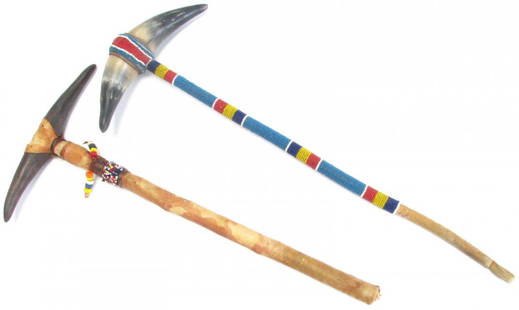 Two Native American Beaded War Clubs