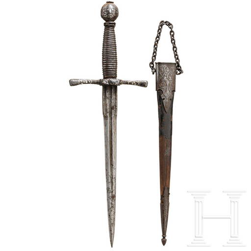 A silver inlaid German left-hand dagger with scabbard, circa 1600 ...