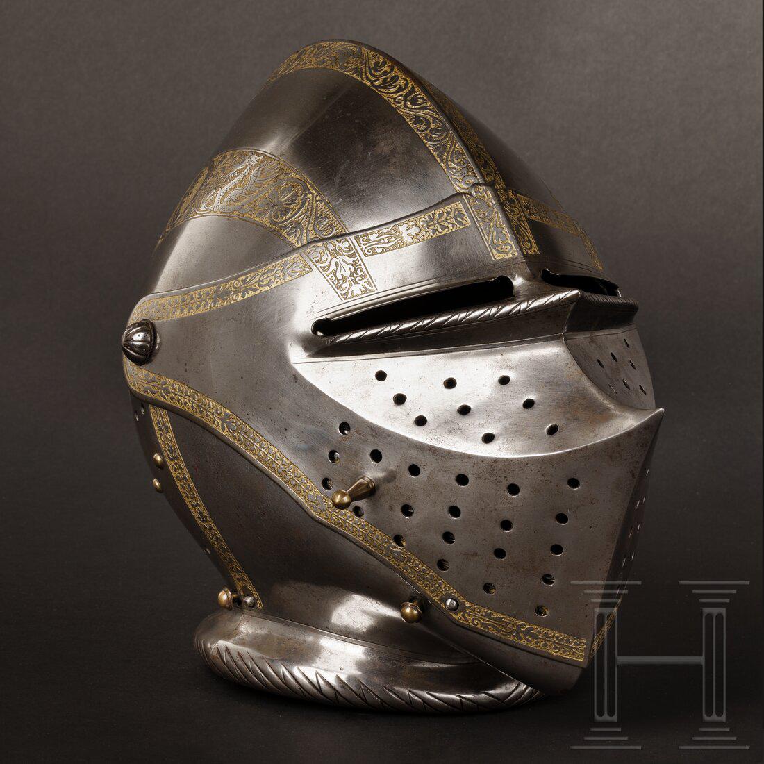 A significant South German close helmet with etched and gilt decor ...