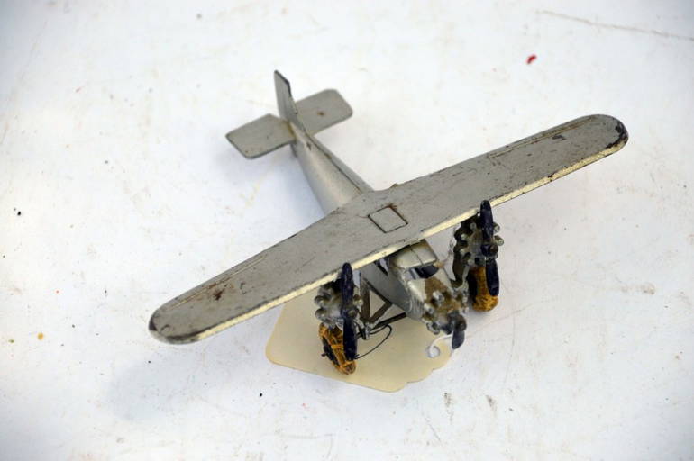 Vintage Metal High Wing Twin Engine Plane