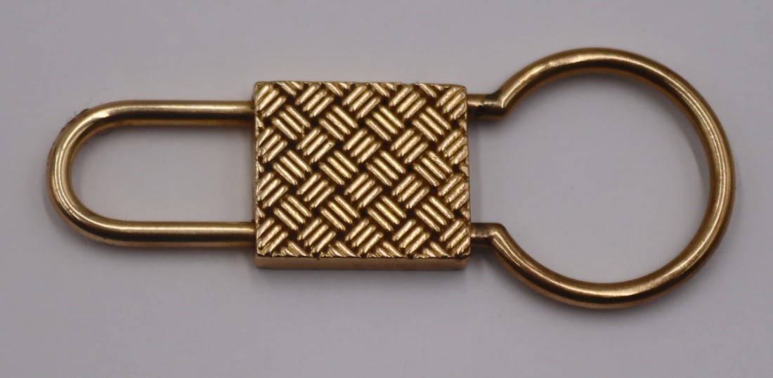 Gold. Van Cleef & Arpels 14kt Gold Key Ring. Auction