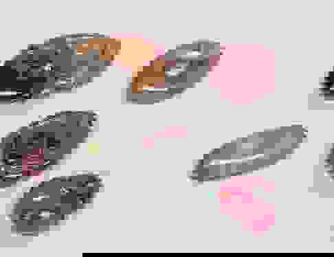 Chinese Carved Tourmaline Toggles Auction