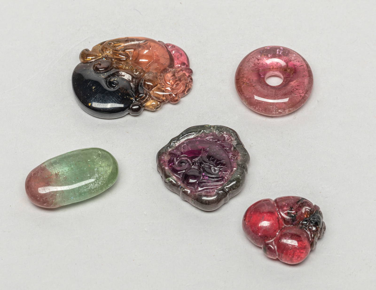 Chinese Carved Tourmaline Toggles Auction