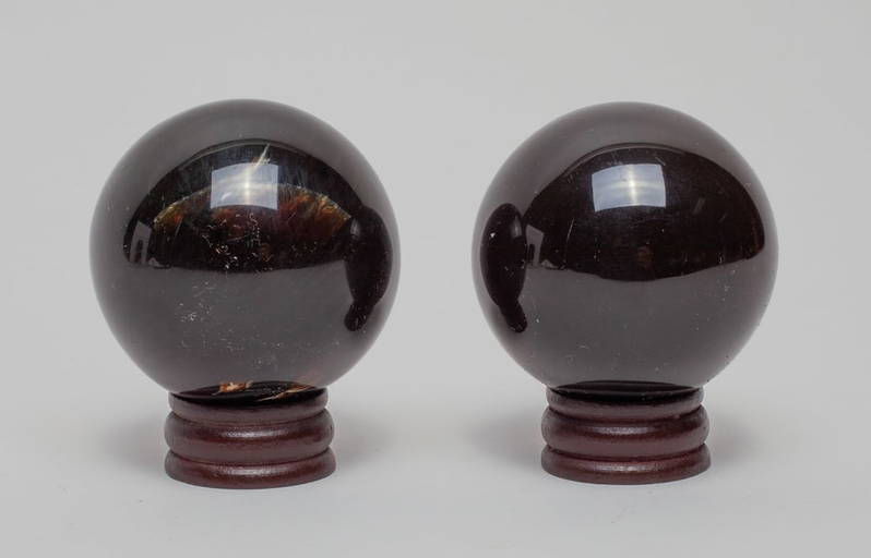 Two Collectible Blue Amber Balls