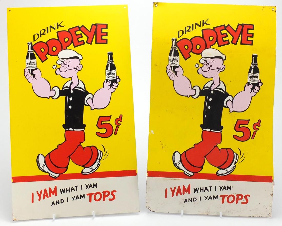 Pair of vintage drink Popeye advertising signs, I Yam