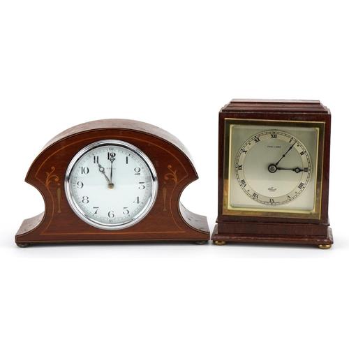 Two mantle clocks comprising a mahogany Elliott mantle clock retailed ...