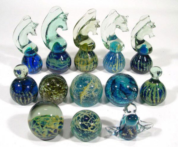 564: 13 Medina glass paperweights with turquoise and mo