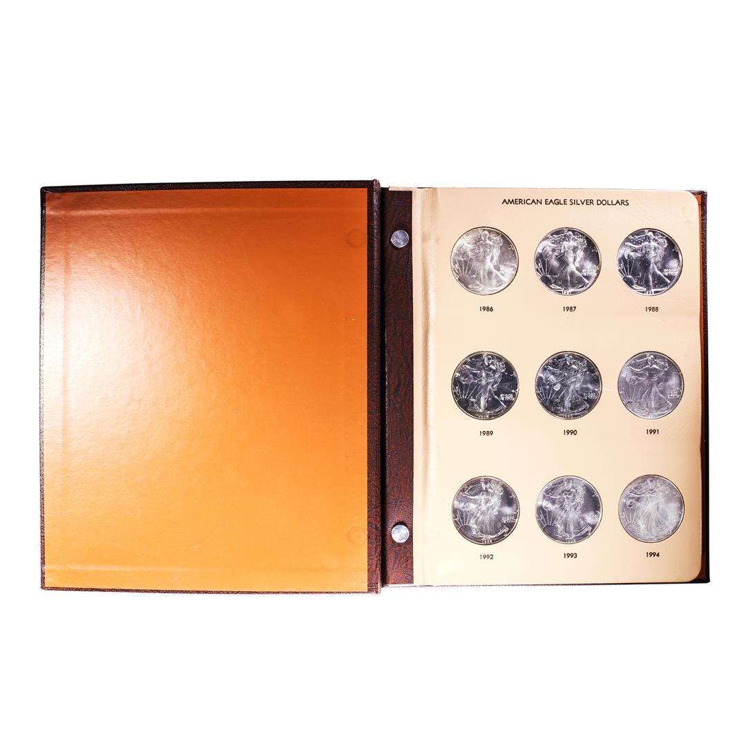 Book Of Brilliant Uncirculated 1986 2005 $1 American Silver Eagle Coins