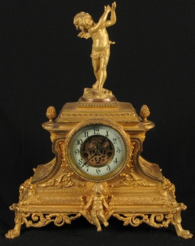 3382: WATERBURY GILT MANTEL CLOCK. 1898. Gilt bronze ma