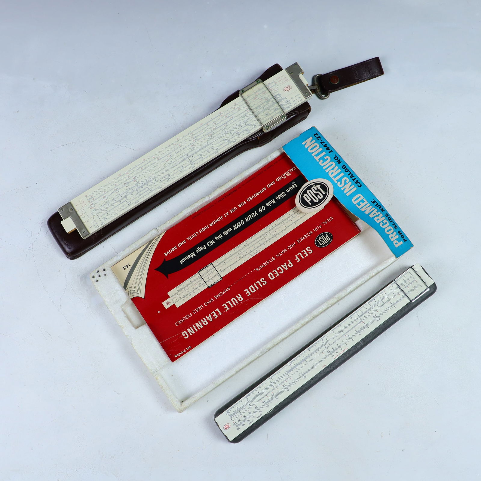 Two Vintage Mathematical Set Post Slide Rules With Manual