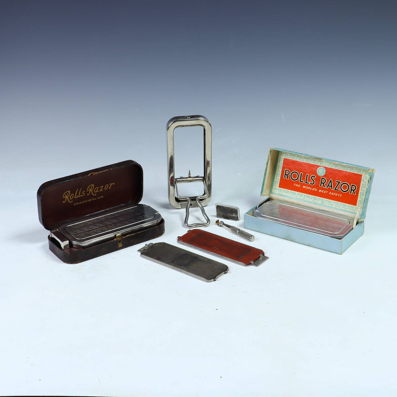 Three Antique Rolls Razors Auction