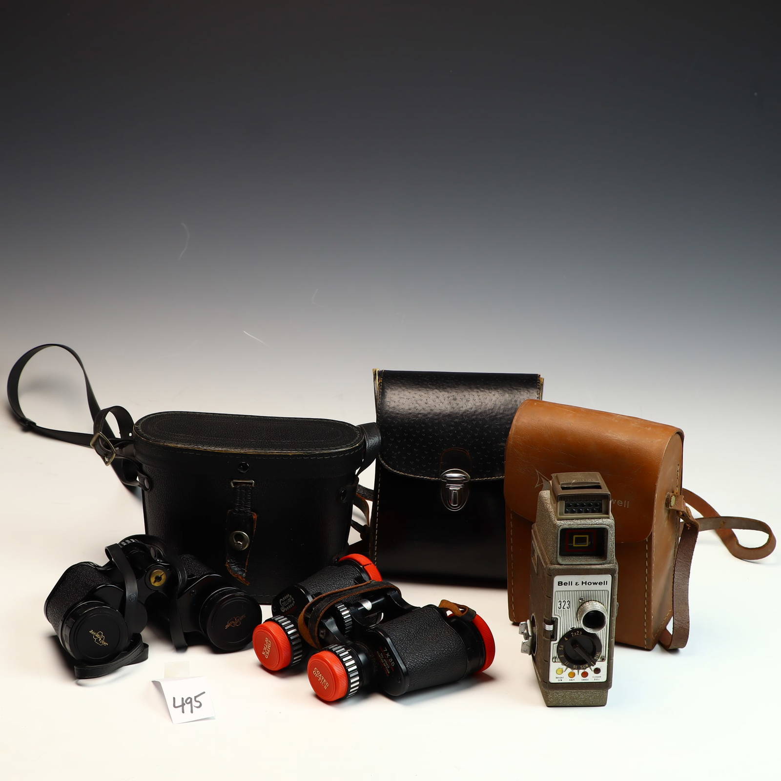 Bell And Howell Vintage Movie 8mm Camera, And Two Binoculars Auction