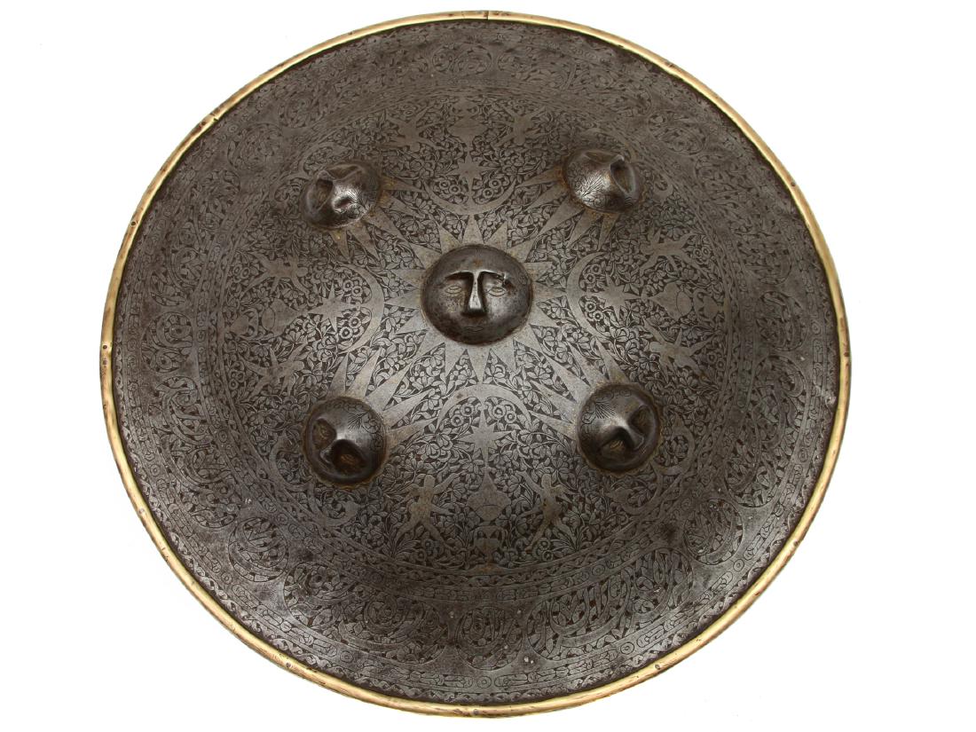 ISLAMIC QAJAR PERIOD BATTLE SHIELD, 19TH C.