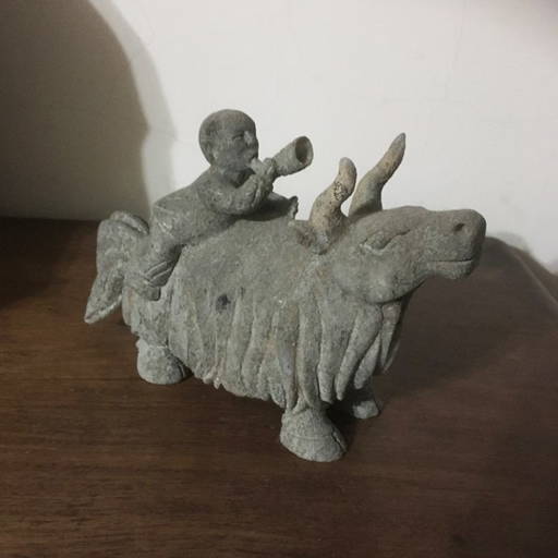 Jade Cowboy Riding A Cow