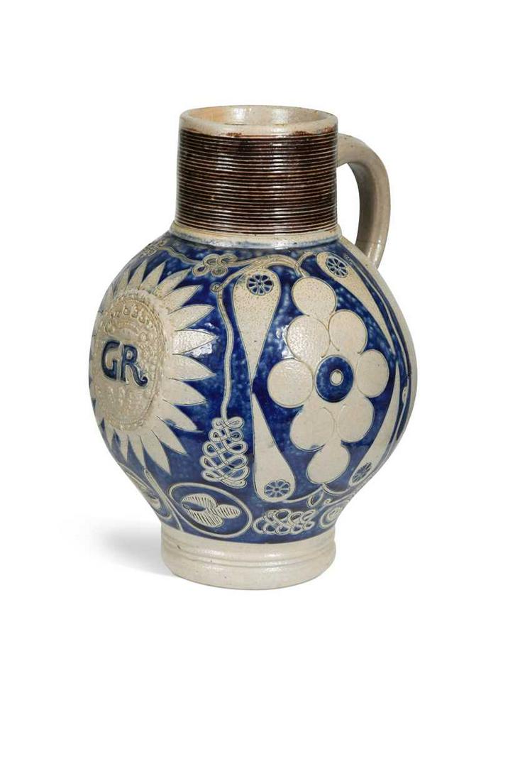A German Westerwald stoneware jug, 18th century, the globular body ...