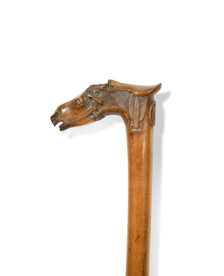 A Greek Carved Olive Wood Walking Cane, Late 19th Century, Auction