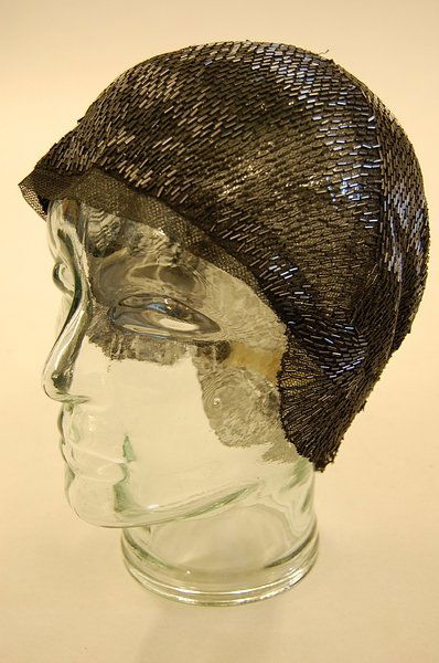 69: A Lanvin beaded skull cap, 1920s, narrow yellow on