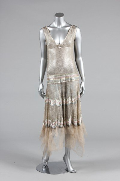 A beaded tulle flapper dress, circa 1929-30, the ground