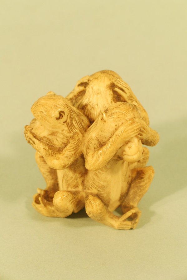35C: A carved ivory group of three monkeys, early 20th