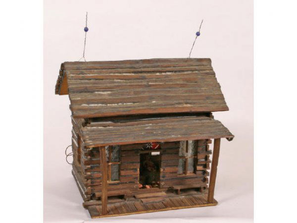 Small House - log cabin made With tobacco sticks