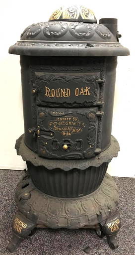 Antique Round Oak Cast Iron Stove