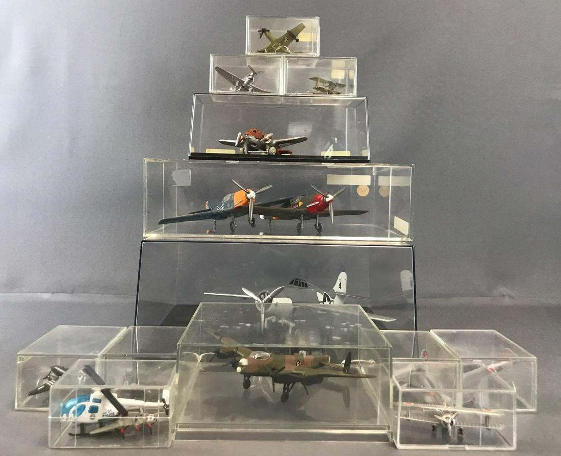 Group of 15 toy airplane replicas in display cases - Jan 25, 2020 ...