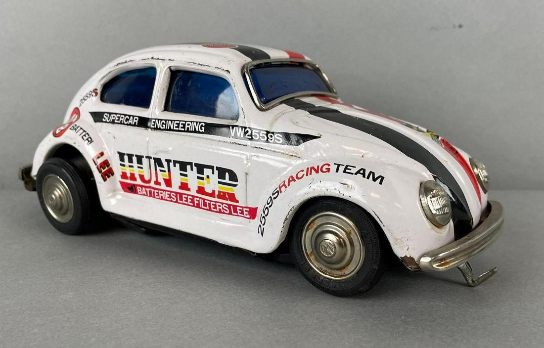 Vintage Battery Operated Volkswagen Bump N Go Tin Litho Racing Bug