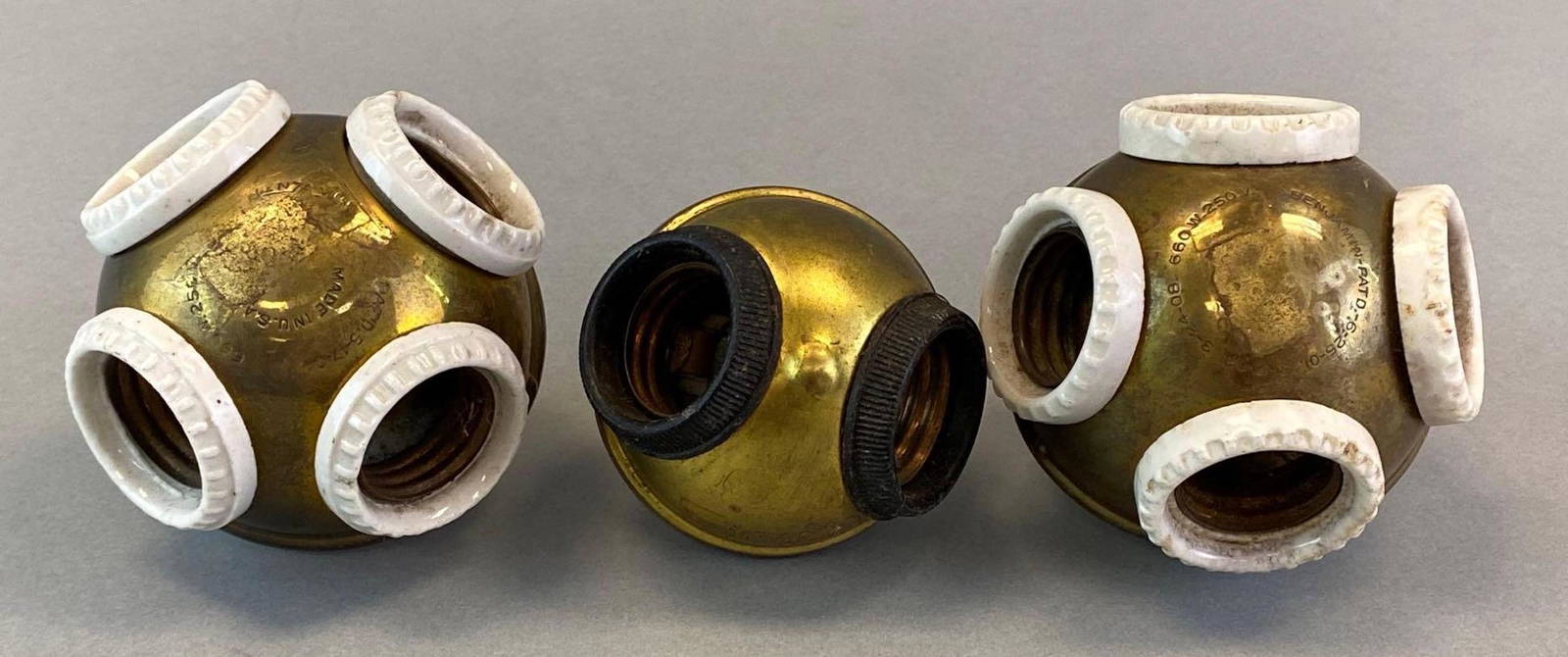 Group Of 3 Benjamin Porcelain And Brass Cluster Socket Plugs Auction