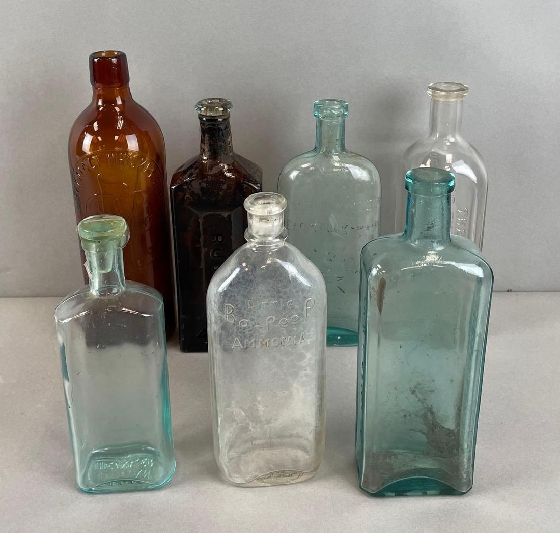 Group Of 7 Antique Glass Elixir Bottles