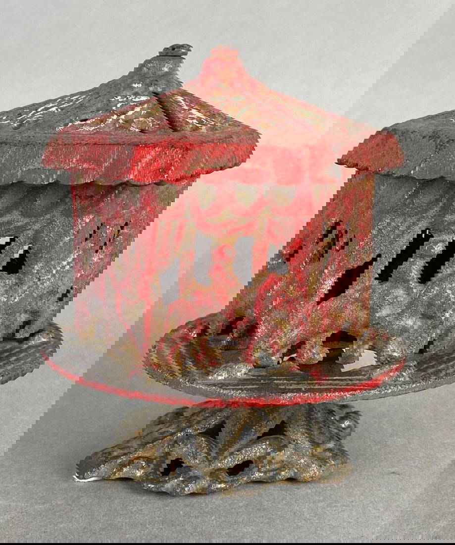 Cast Iron Spinning Carousel Coin Bank Auction