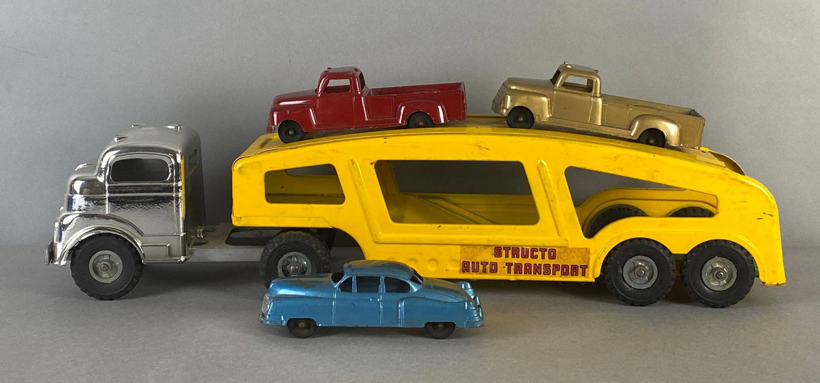 Structo Auto Transport Pressed Steel Hauler With Vehicles Auction