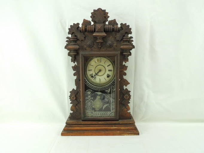 The E. Ingraham Ornate Oak Kitchen Clock With Pendulum