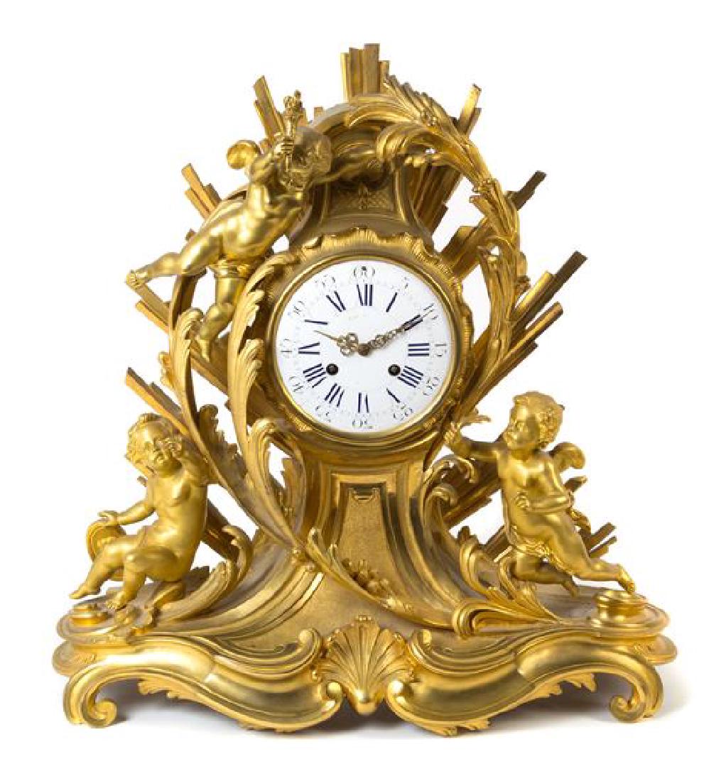 A Napoleon III Gilt Bronze Mantel Clock