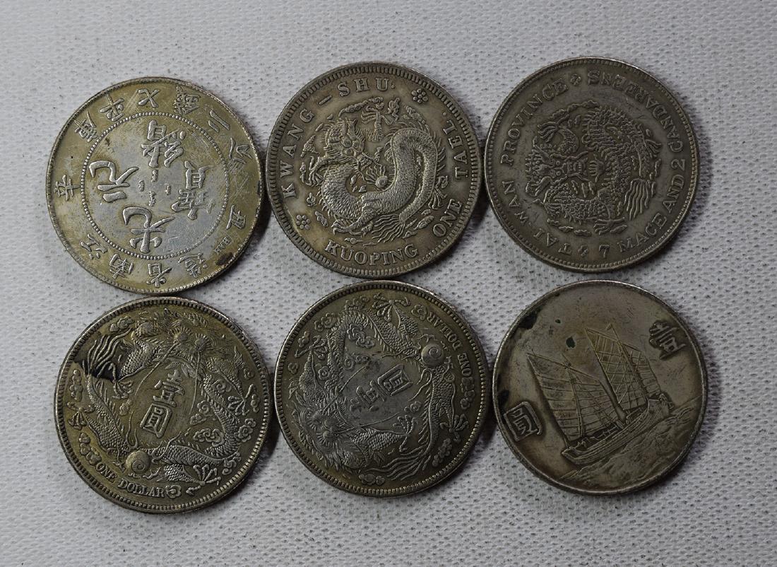Six Chinese Dollar Coins