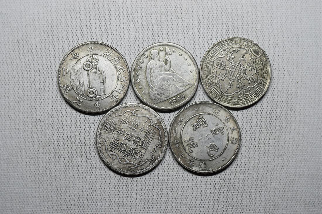 FIVE CHINESE DOLLAR COINS