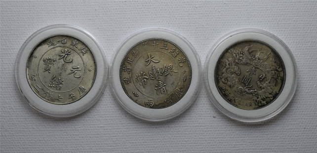 Three Chinese Silver Dollar Coins