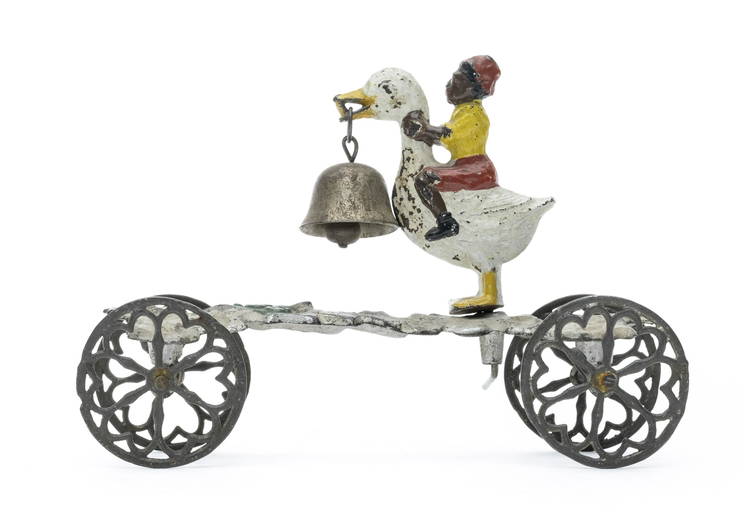 Black Boy Riding Duck Bell Toy