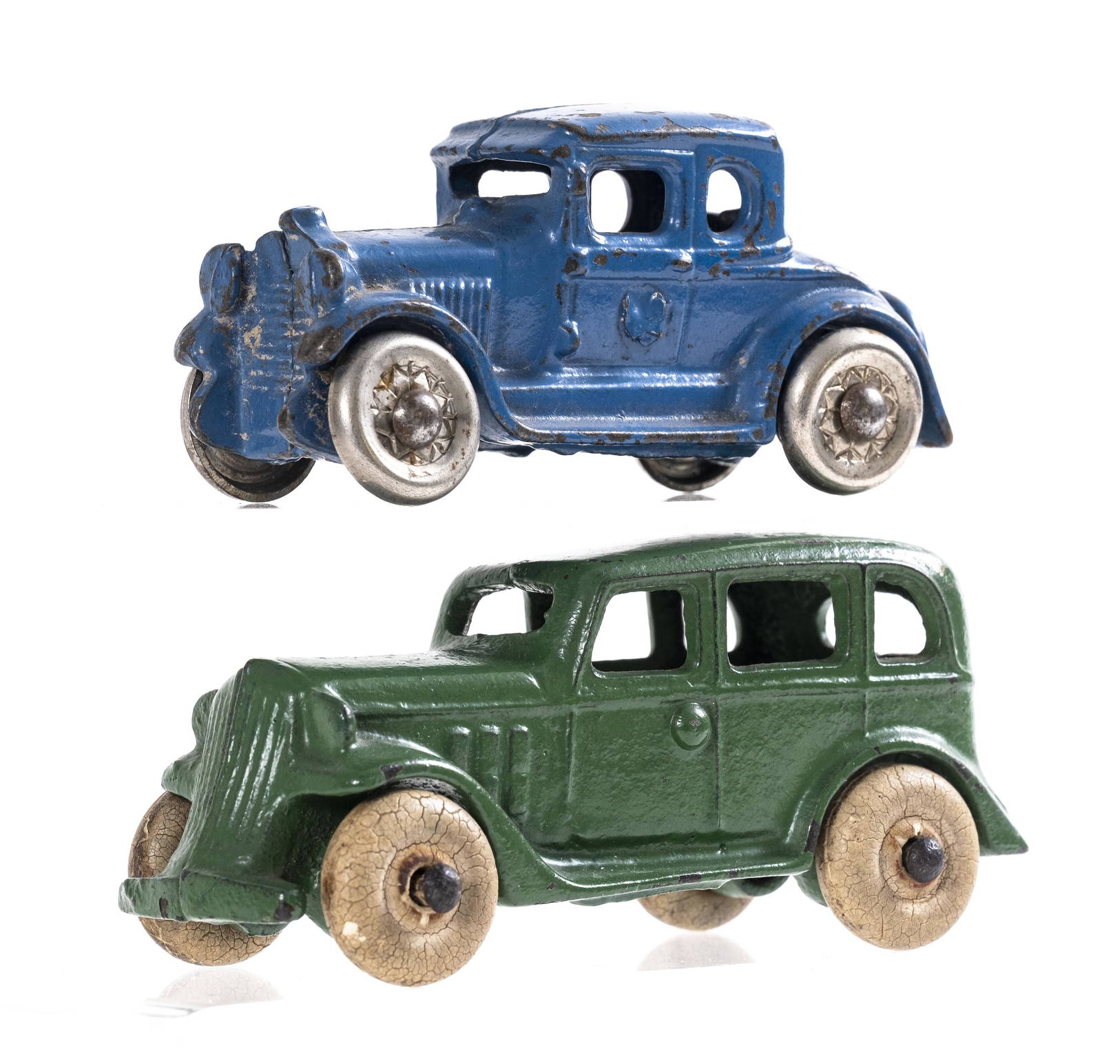 Small Powder Blue Coupe And A Bright Green Sedan Auction