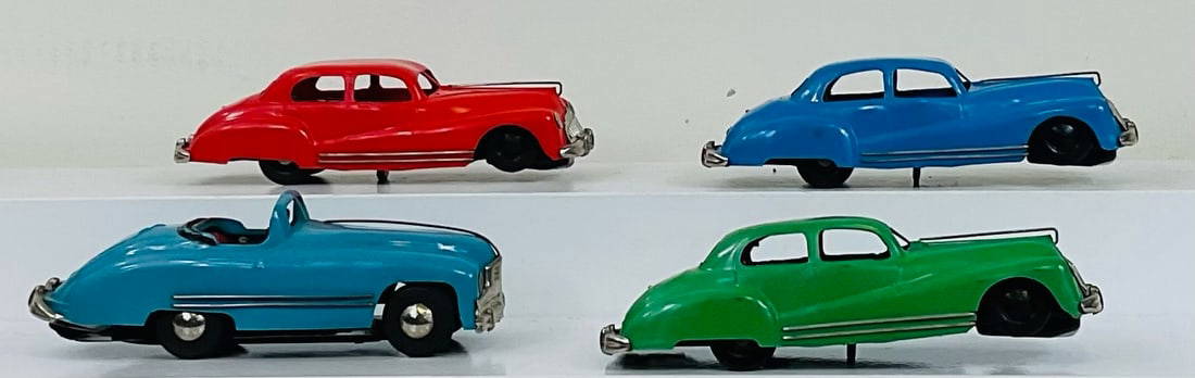 Four Plastic Windup Cars