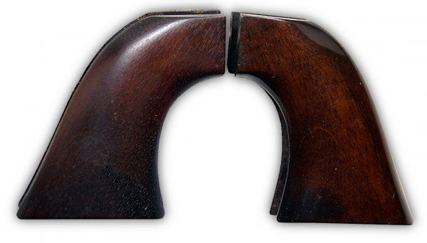 110: 2 Colt SAA 1-piece walnut grips, super condition.