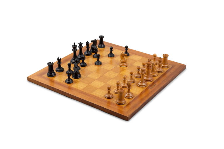 A Staunton Pattern Chess Set And Chess Board By J.jaques London, The ...