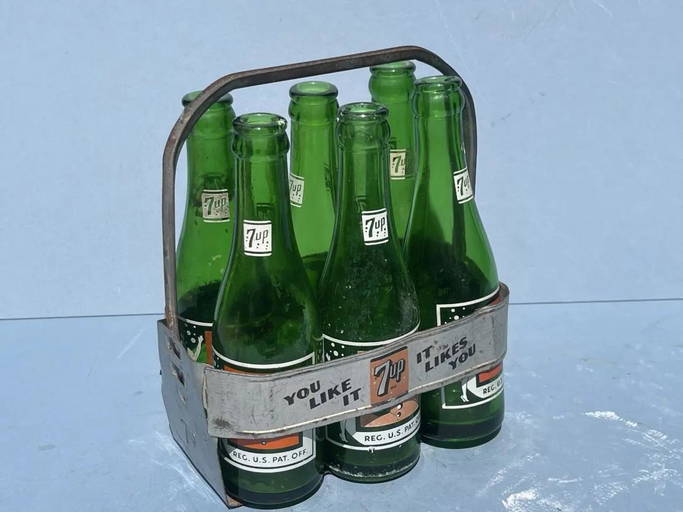 A Vintage Six Pack Case Of 7up Bottles & Carrier
