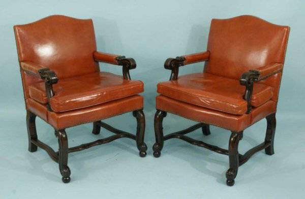 Pair Of Armchairs In Rust Colored Leather