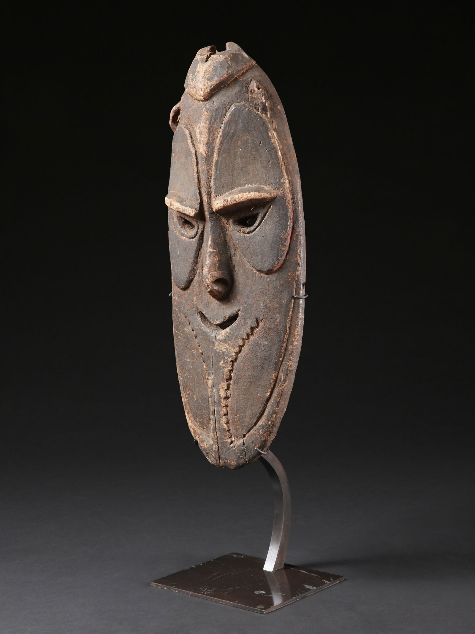 A Biwat Ancestor Mask Auction
