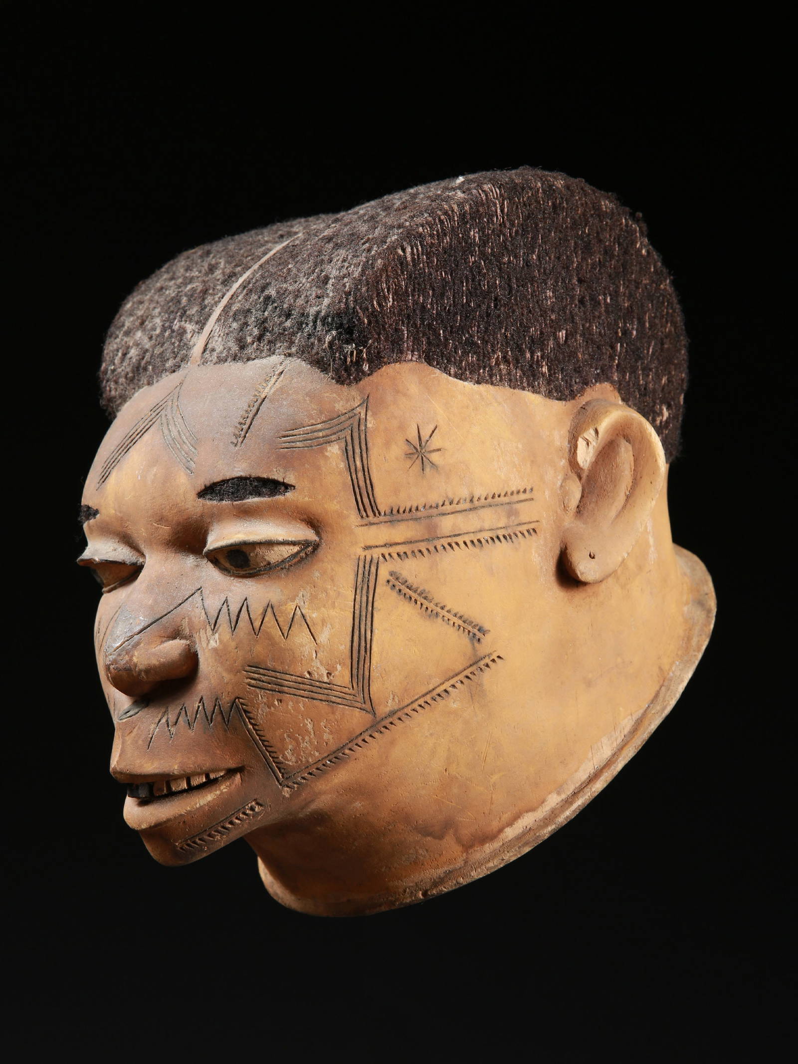 A Makonde Helmet Mask, "lipiko" Auction